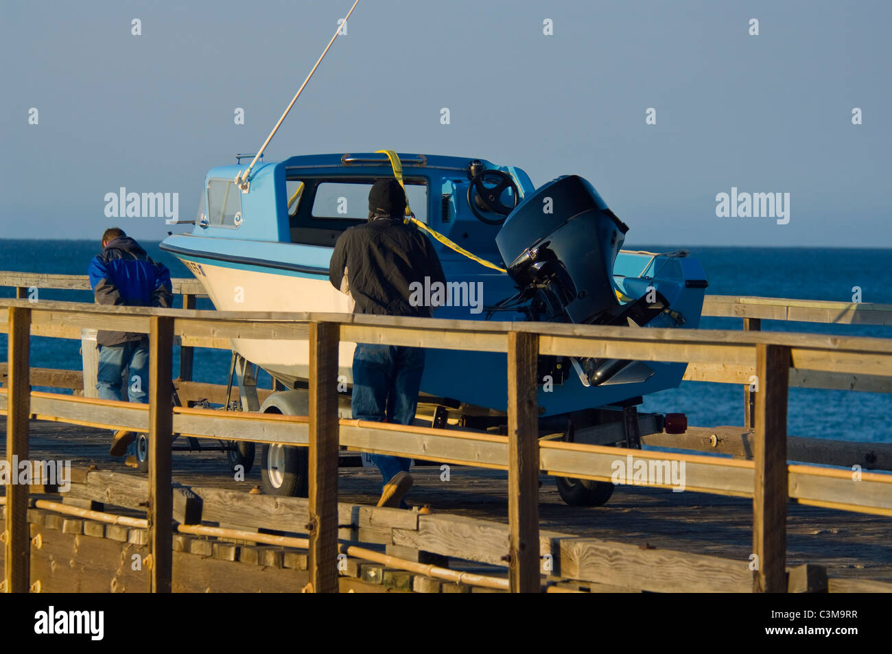 Man pulling a boat hi-res stock photography and images - Alamy