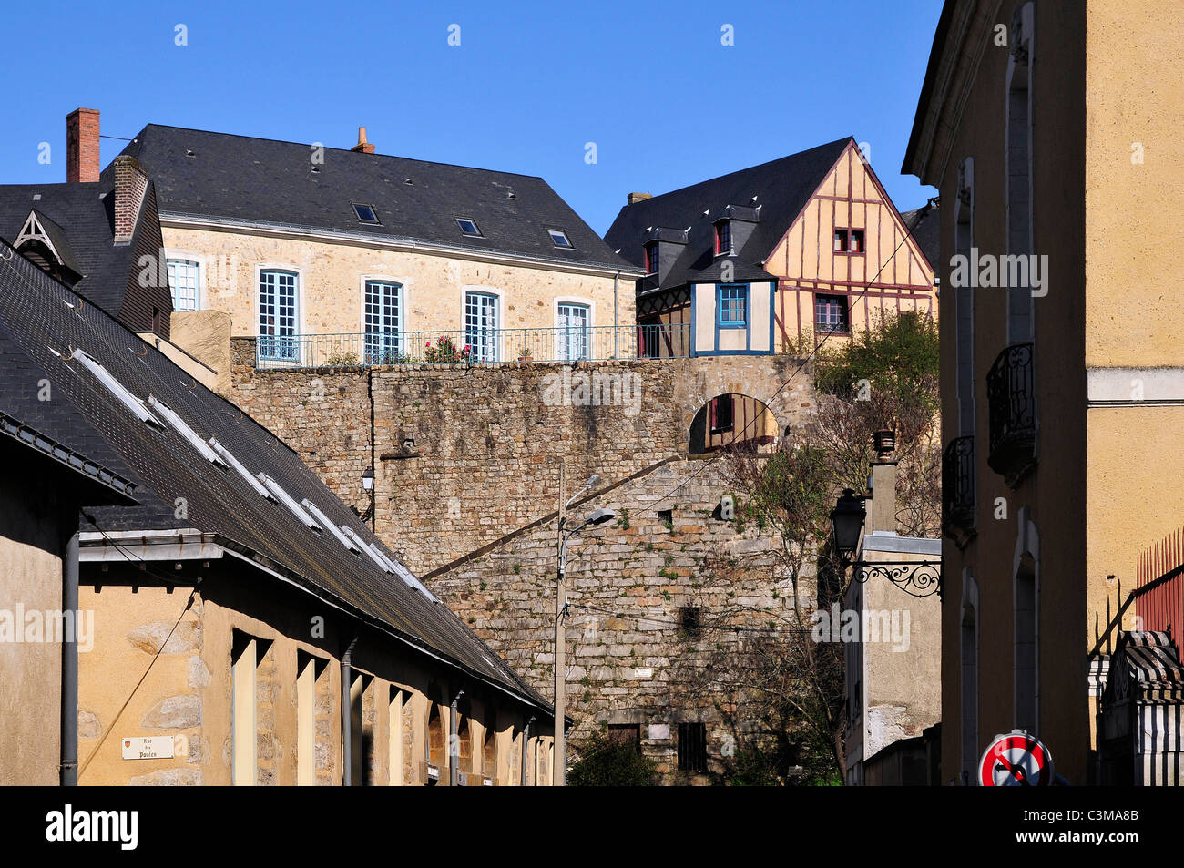 Typical houses and the big old stone wall at Le Mans of the Pays de la ...