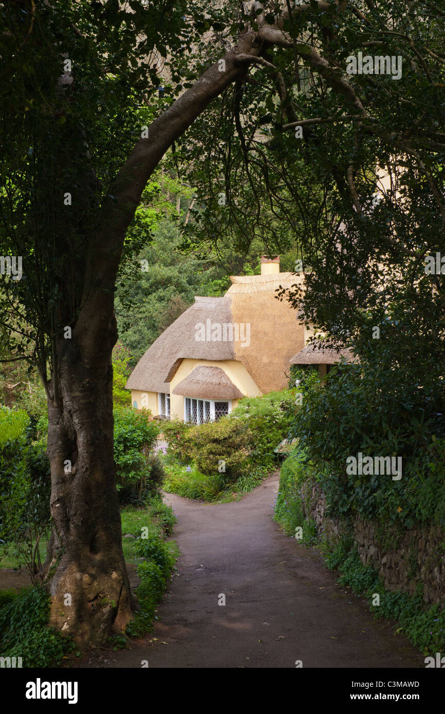 A thatched cottage in the Exmoor village of Selworthy, Somerset ...