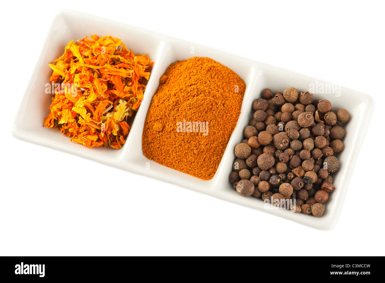 Spices. Mix of different dry herbs: pepper balls, saffron and chili on ...