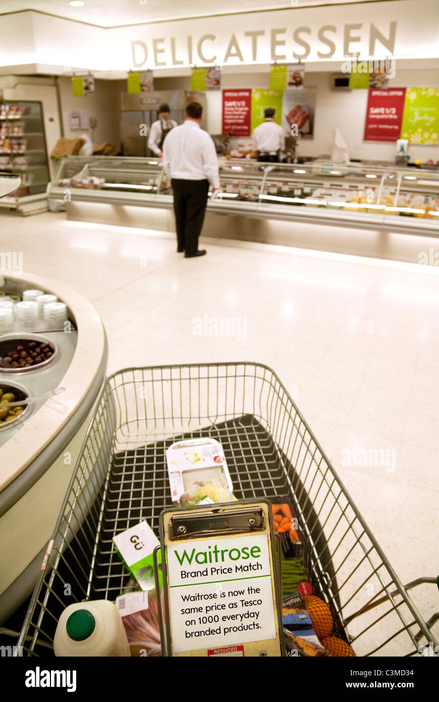Staff at the delicatessen counter, Waitrose supermarket Newmarket ...