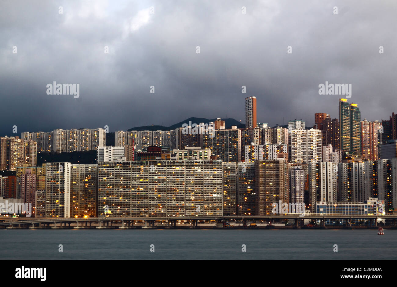 apartment building at night Stock Photo - Alamy