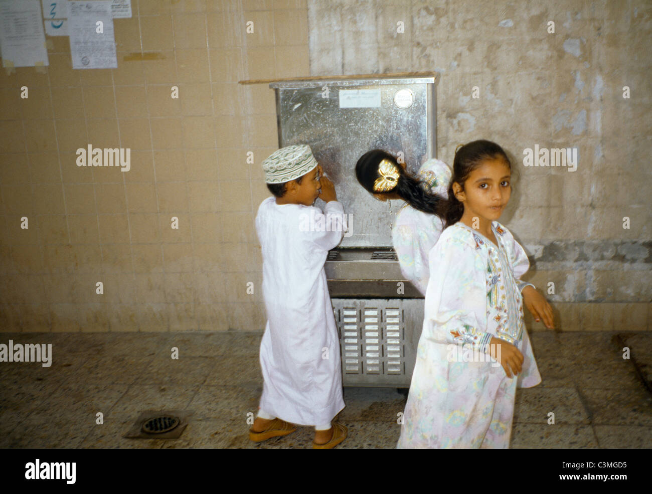 Fujairah UAE Children In Souk Drinking Water From Metal Water Fountain ...