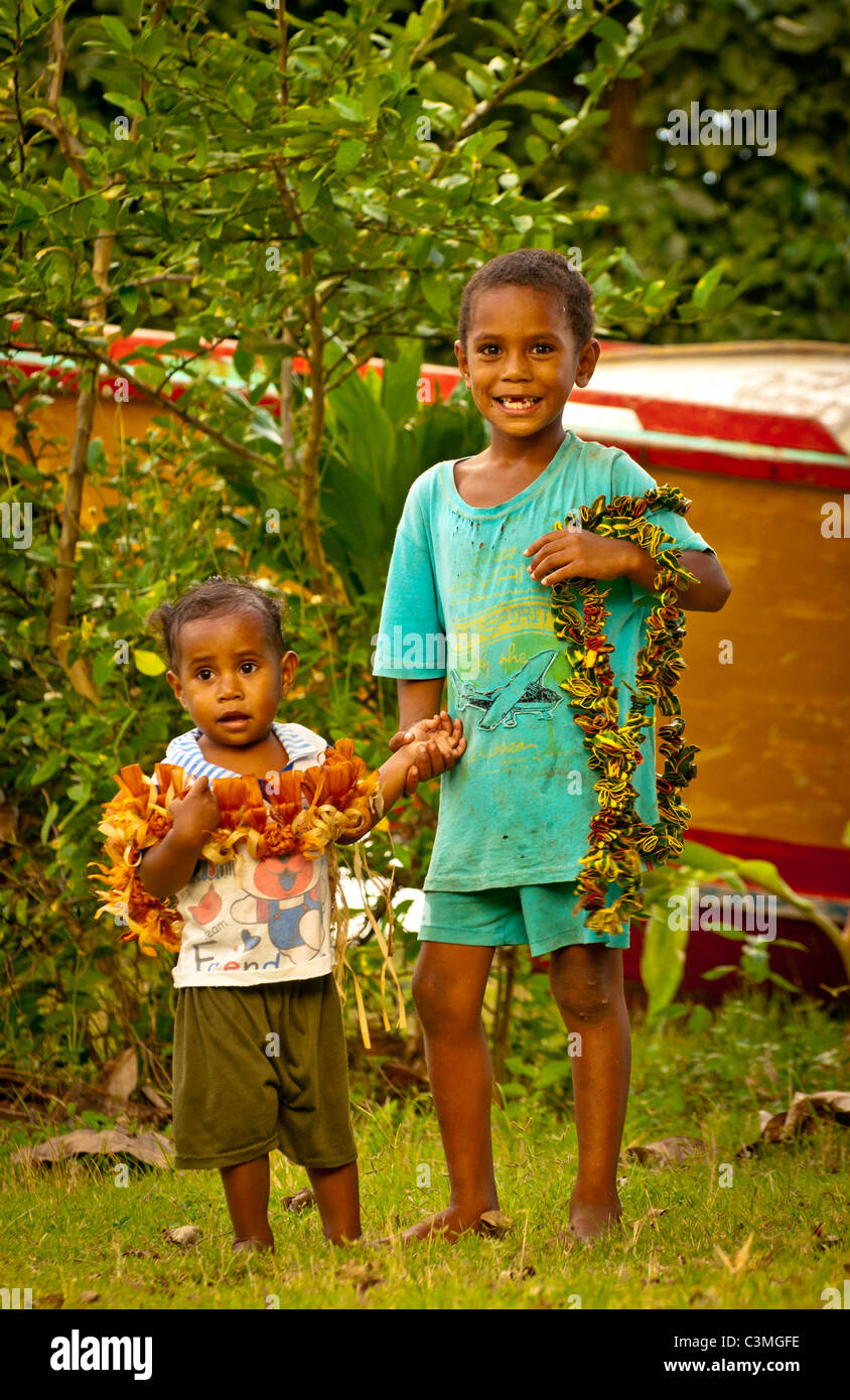 Fijian children prepare for guests in Yalobi Village, Waya Island among ...