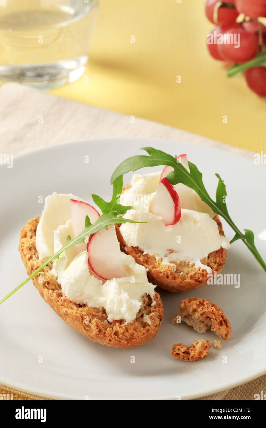 Crispy rolls and cheese spread - closeup Stock Photo - Alamy