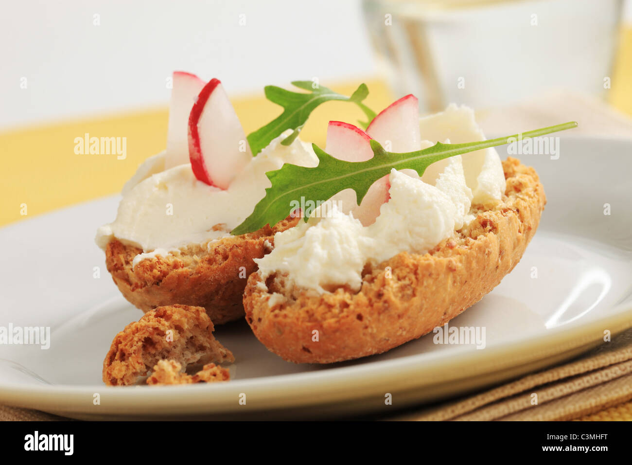 Crispy rolls and cheese spread - closeup Stock Photo - Alamy