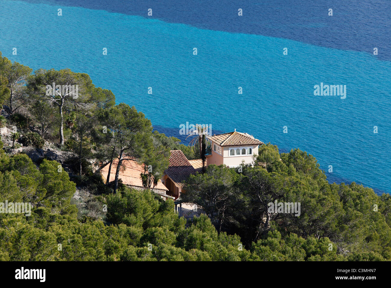Spain, Balearic Islands, Majorca, View of building between trees Stock ...