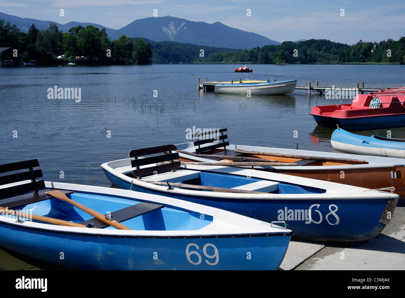 Europe, Germany, Bavaria, Upper Bavaria, Boat moored in lake with ...