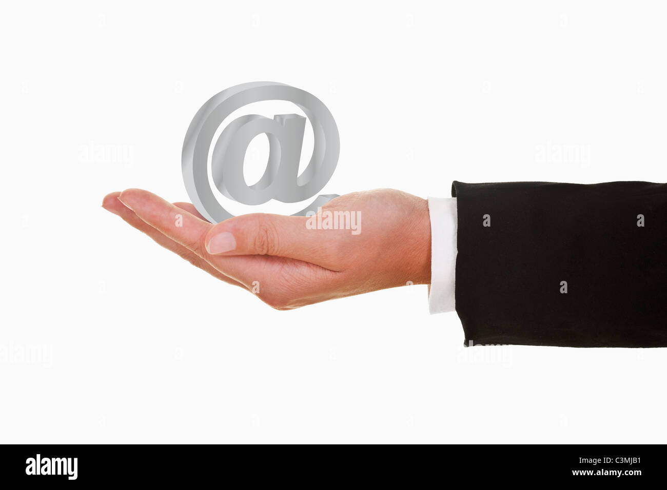 at-sign in woman hand against white background Stock Photo - Alamy