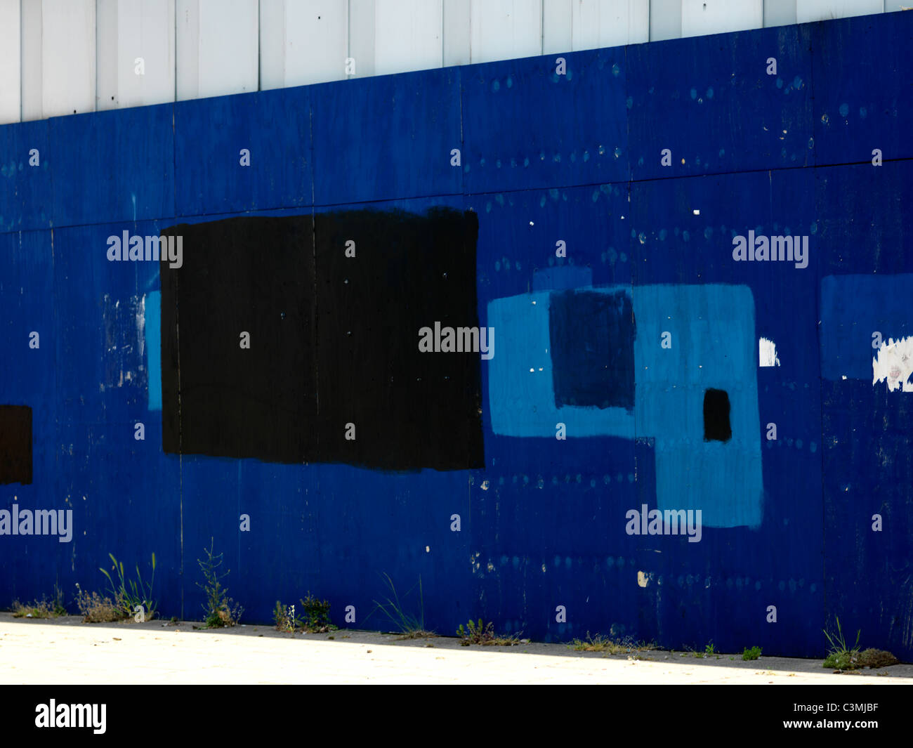 Painting On A Wall On The Side Of A Building Surrey England Stock Photo ...