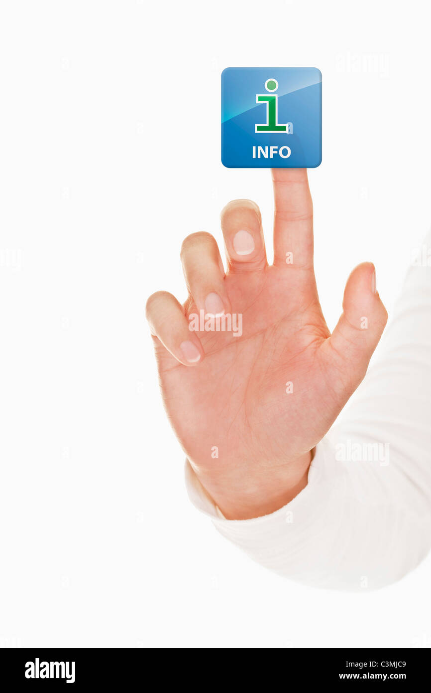 Human hand touching info icon Stock Photo - Alamy