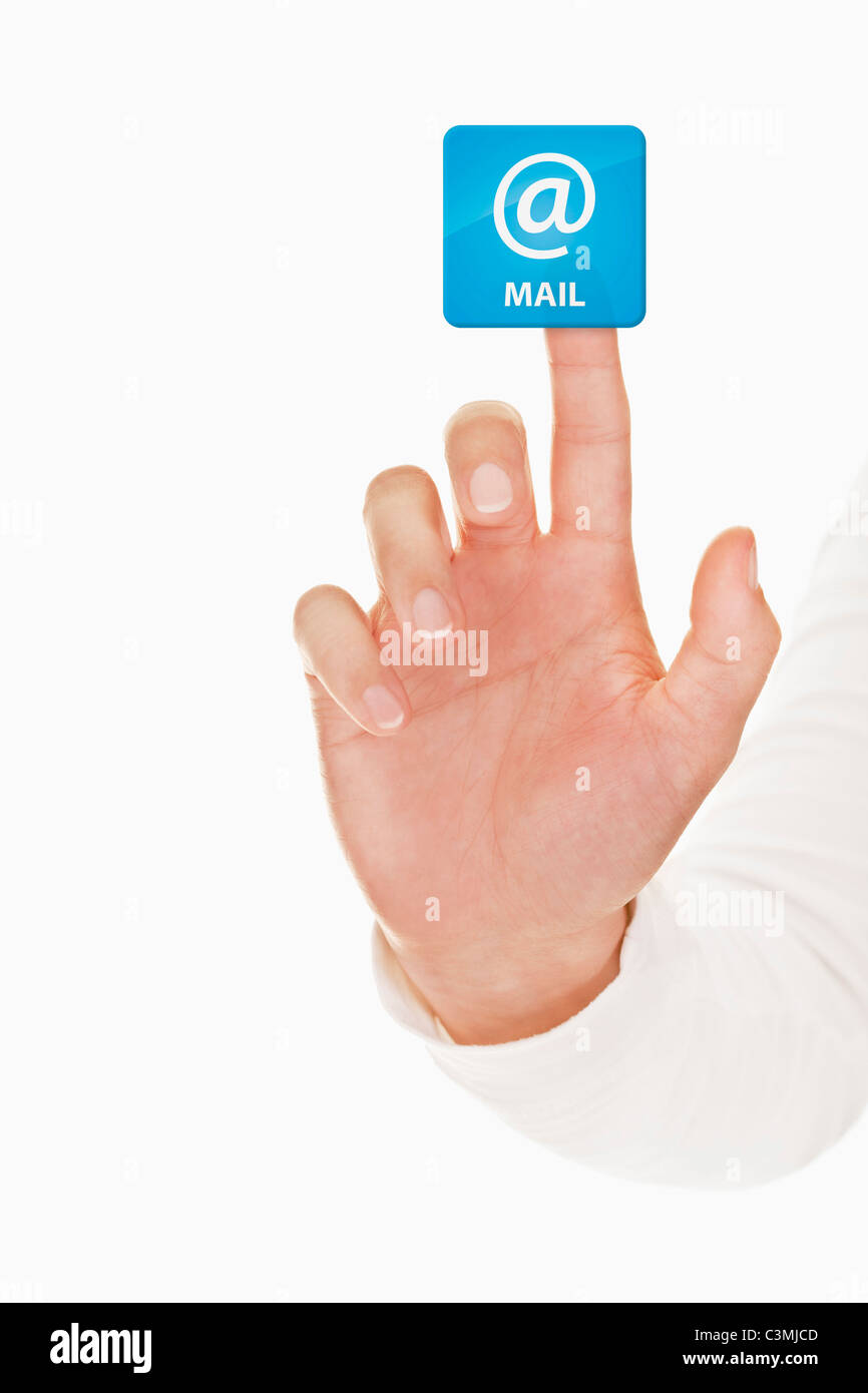 Human hand touching mail icon Stock Photo - Alamy