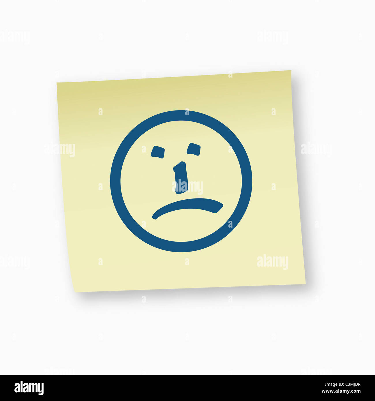 Sad face sign on adhesive note, close-up Stock Photo - Alamy