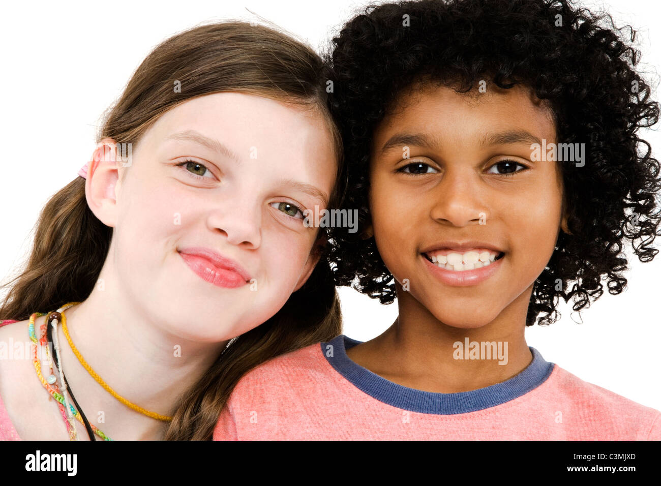Two friends smiling isolated over white Stock Photo - Alamy