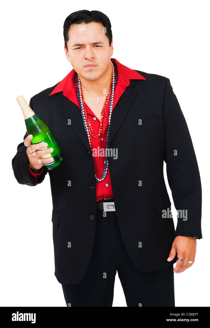 Latin American man holding a champagne bottle isolated over white Stock ...