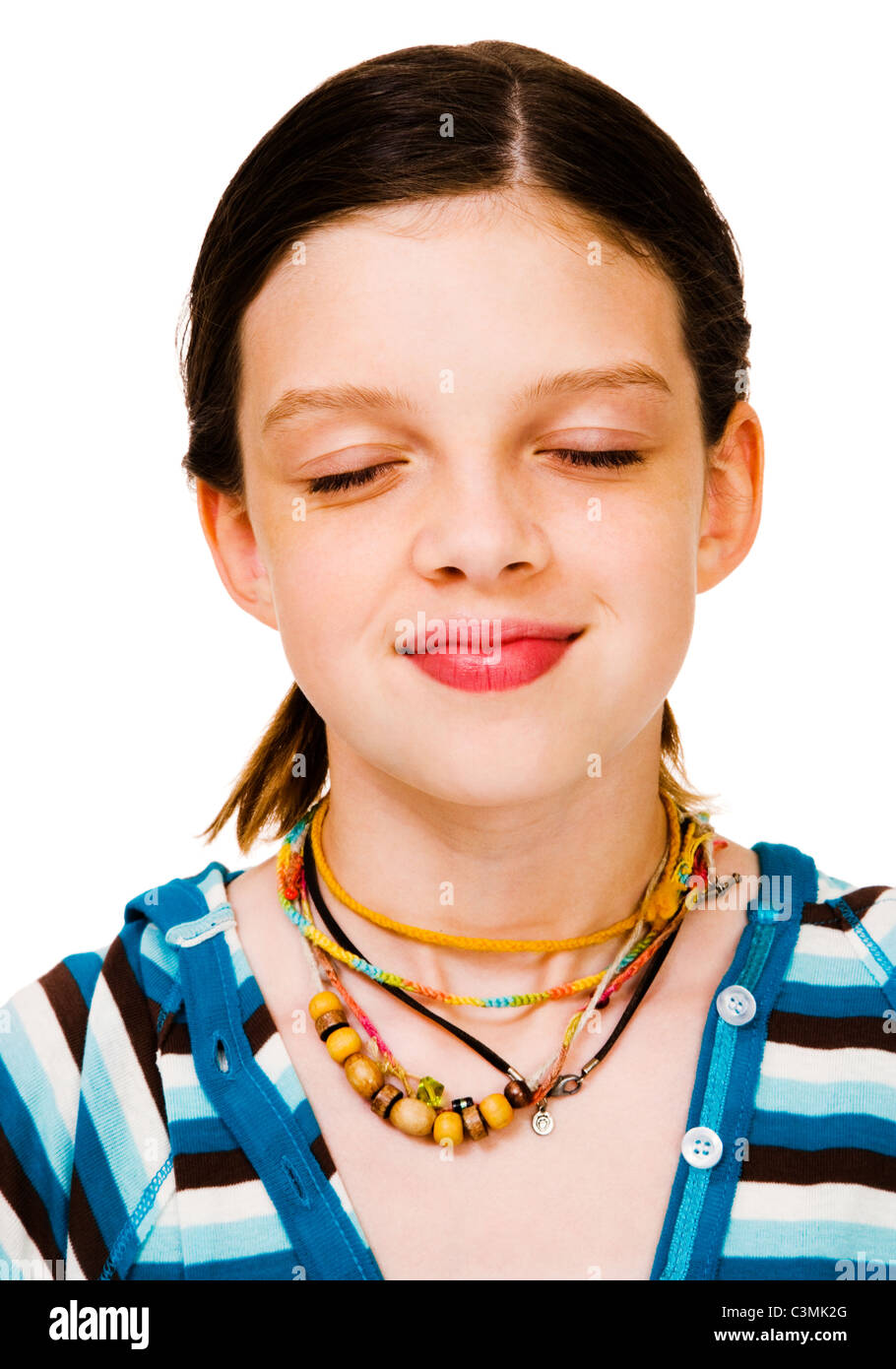 Cute girl day dreaming and smiling isolated over white Stock Photo - Alamy