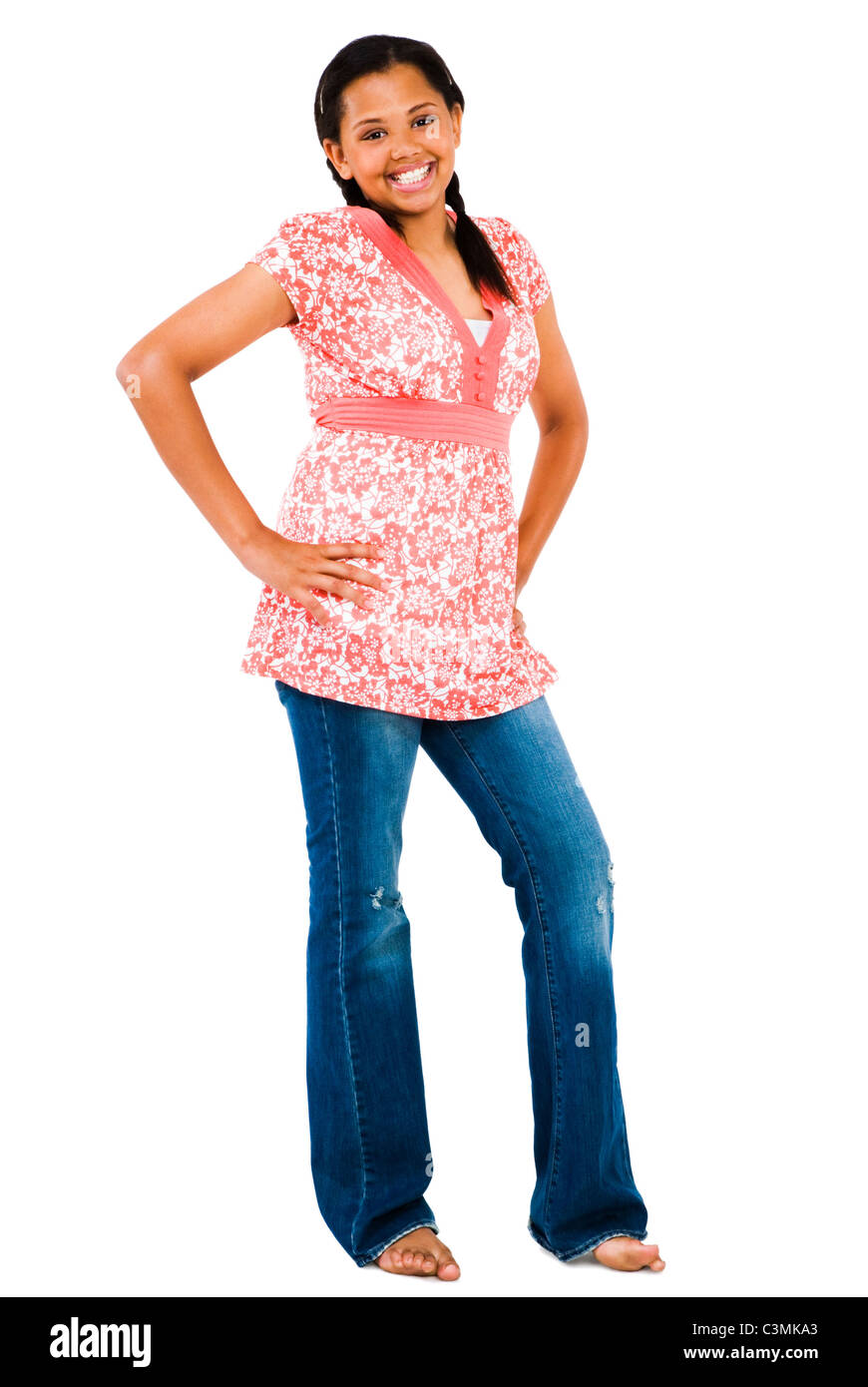 Portrait of a teenage girl standing isolated over white Stock Photo - Alamy