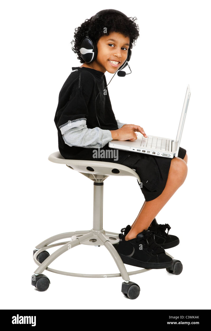 Child using internet isolated over white Stock Photo - Alamy