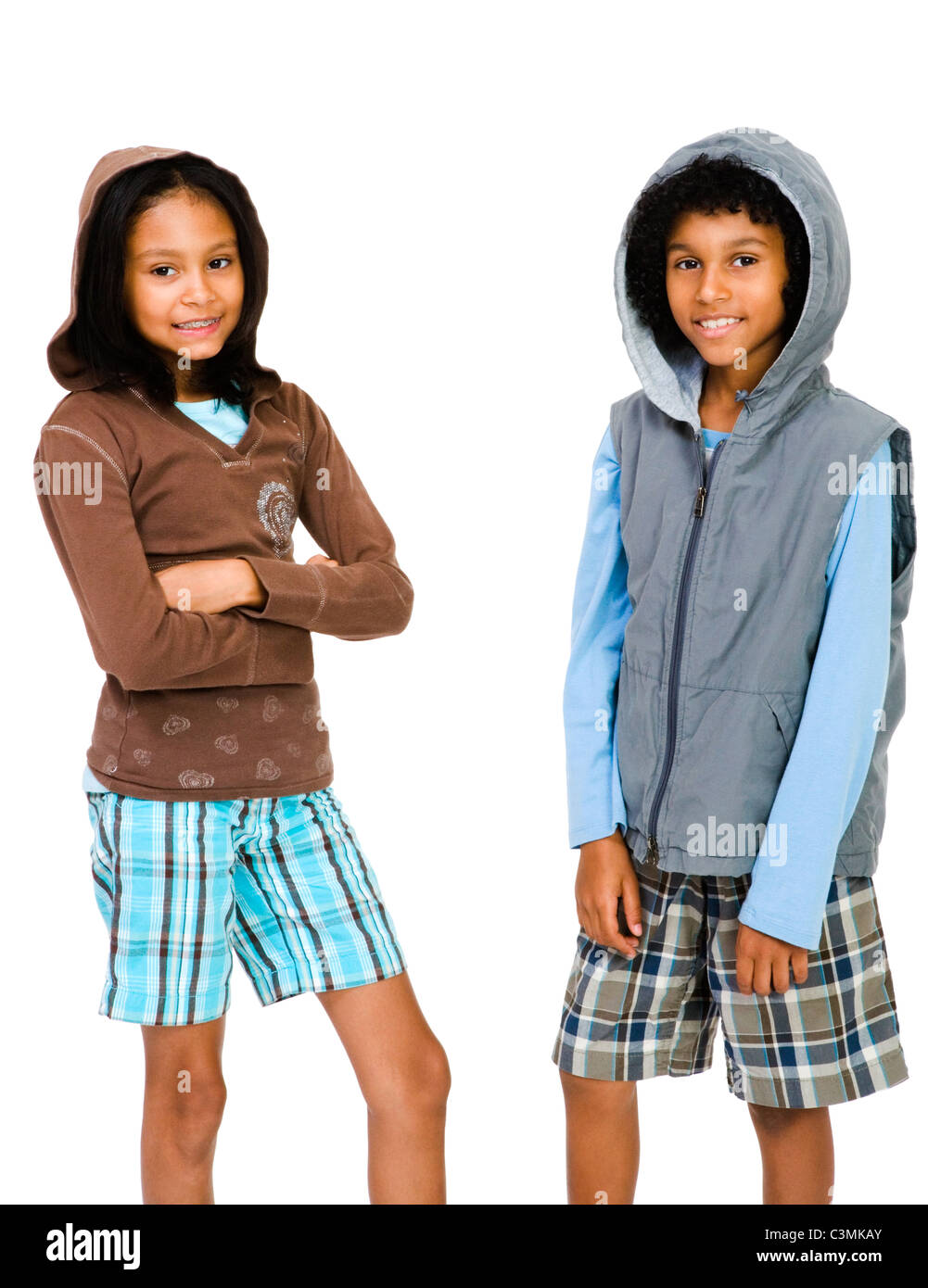 Portrait of two sisters standing together isolated over white Stock ...