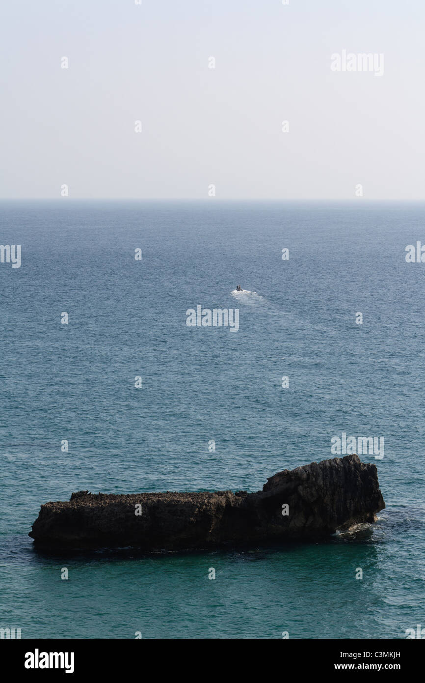 Portugal, Algarve, Sagres, View of tonel beach with boat in sea Stock ...