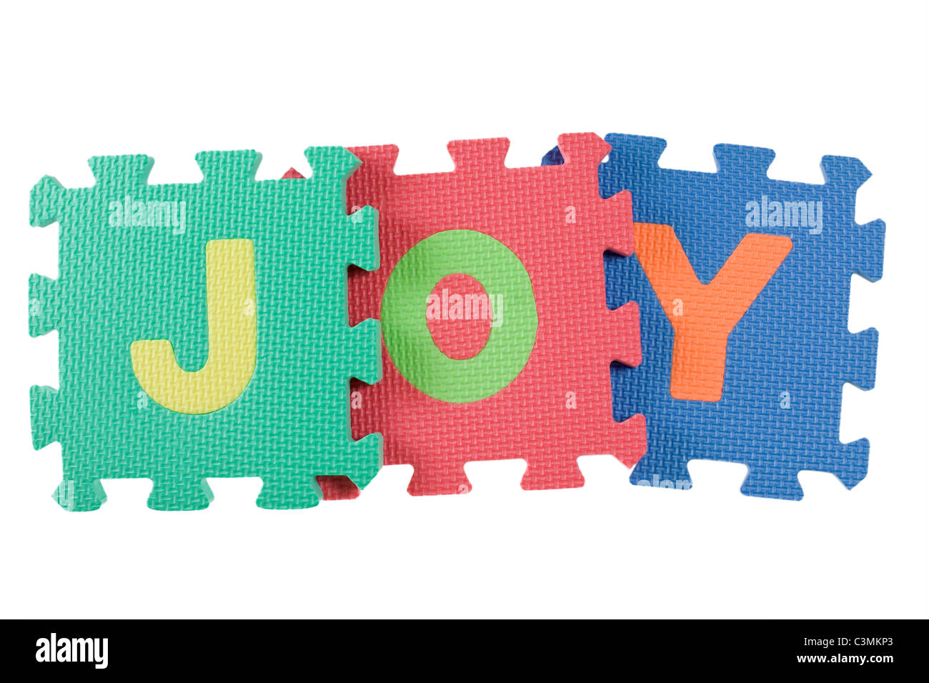 Alphabet blocks forming the word JOY isolated on white background Stock ...
