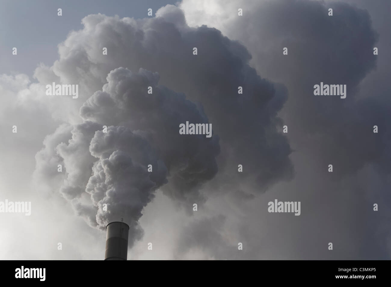 Austria, Vocklabruck, Lenzing, Smoke emitting out of factory Stock ...