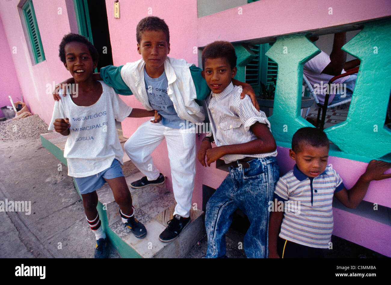 Los Charamicos Domican Republic Young Boys Outside Brightly Painted ...