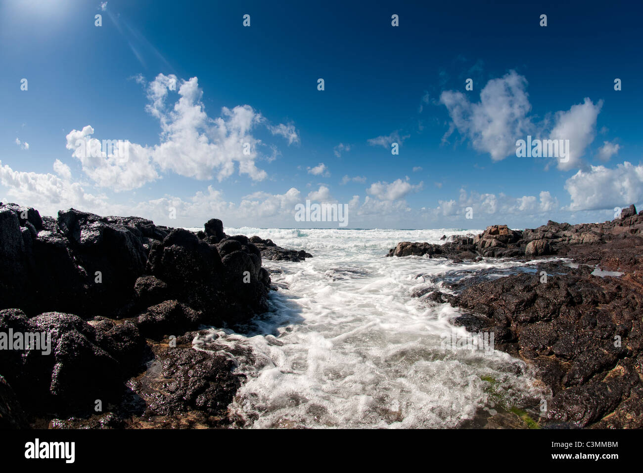Waves crashing over lava rocks hi-res stock photography and images - Alamy