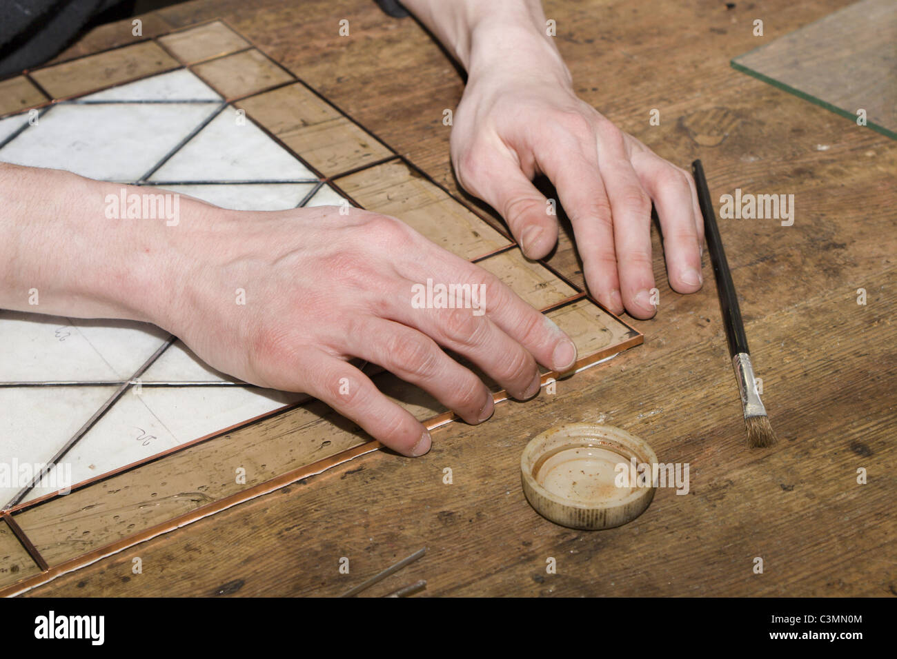 hands of glassmaker at the work Stock Photo - Alamy