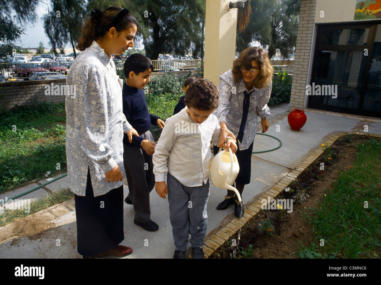 Kuwait City Kuwait Autistic Children And Volunteer Workers Stock Photo ...