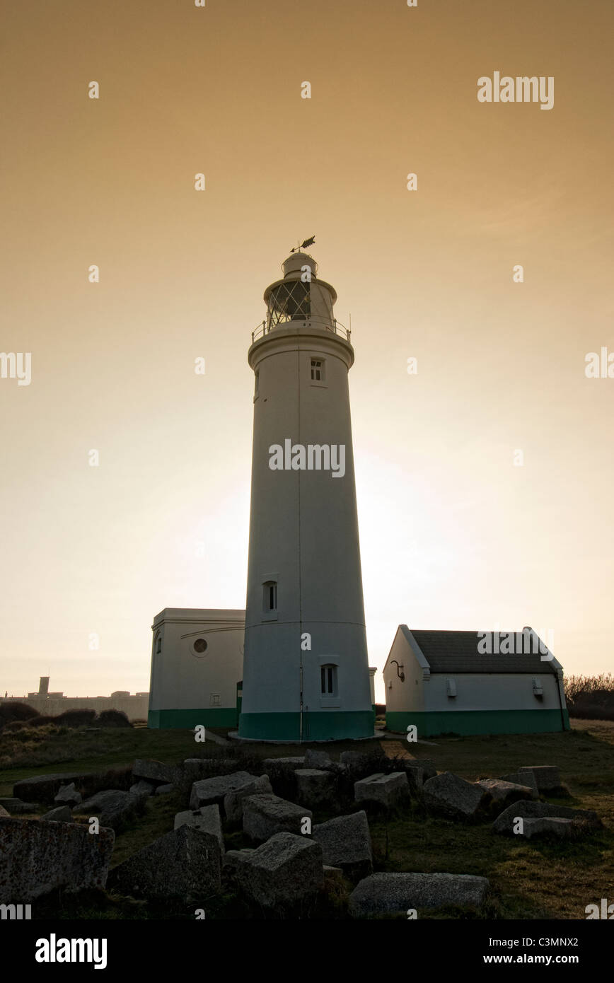 Hurst castle lighthouse at sunset Stock Photo - Alamy