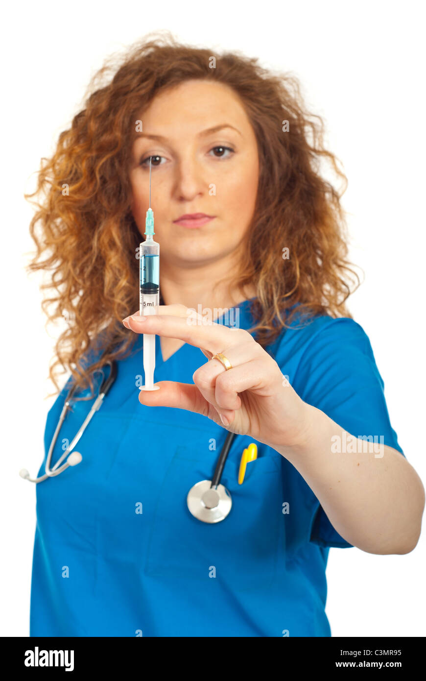 Doctor woman holding syringe in front of camera isolated on white ...