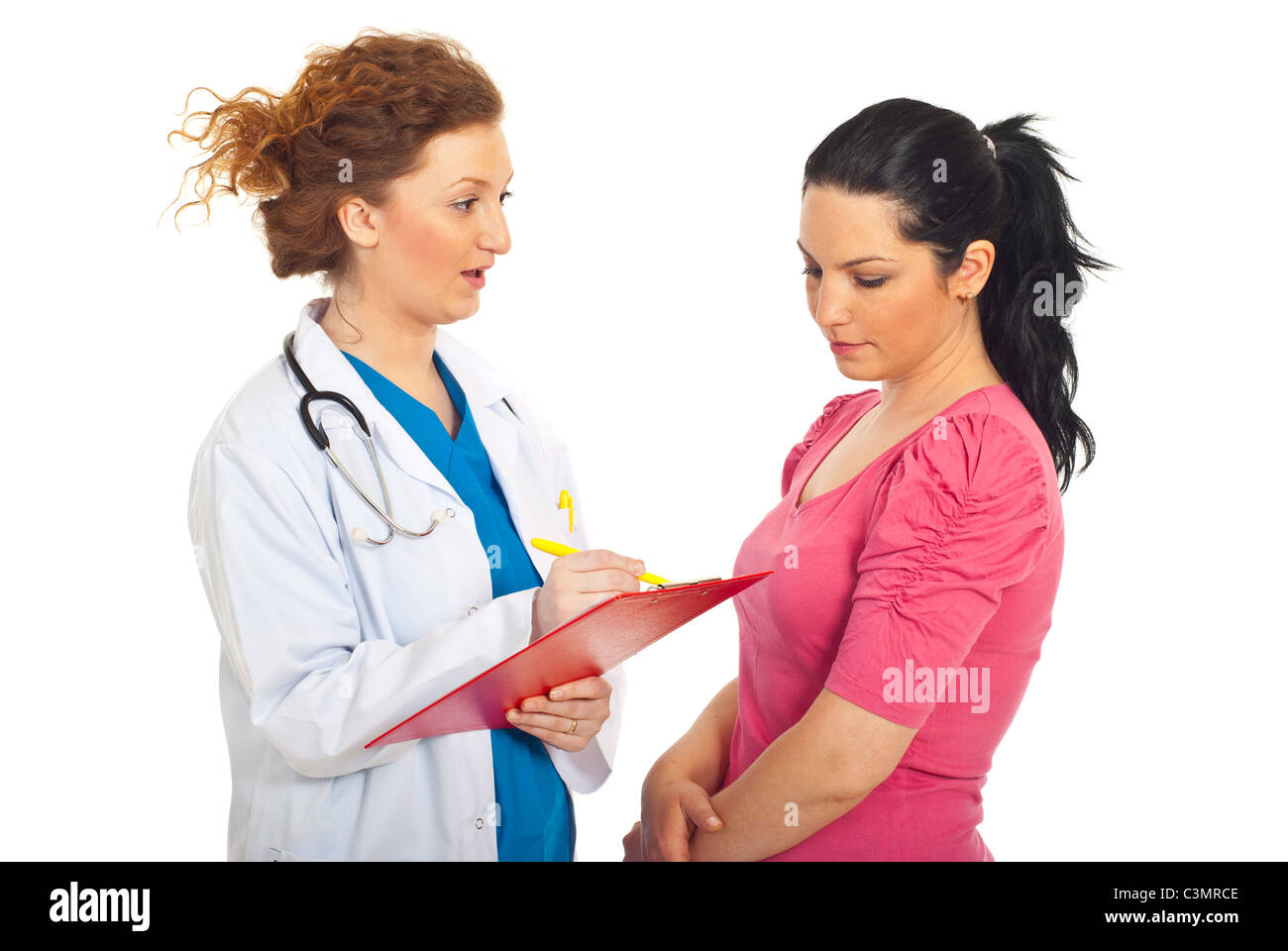 Doctor having conversation with patient woman and giving prescription ...