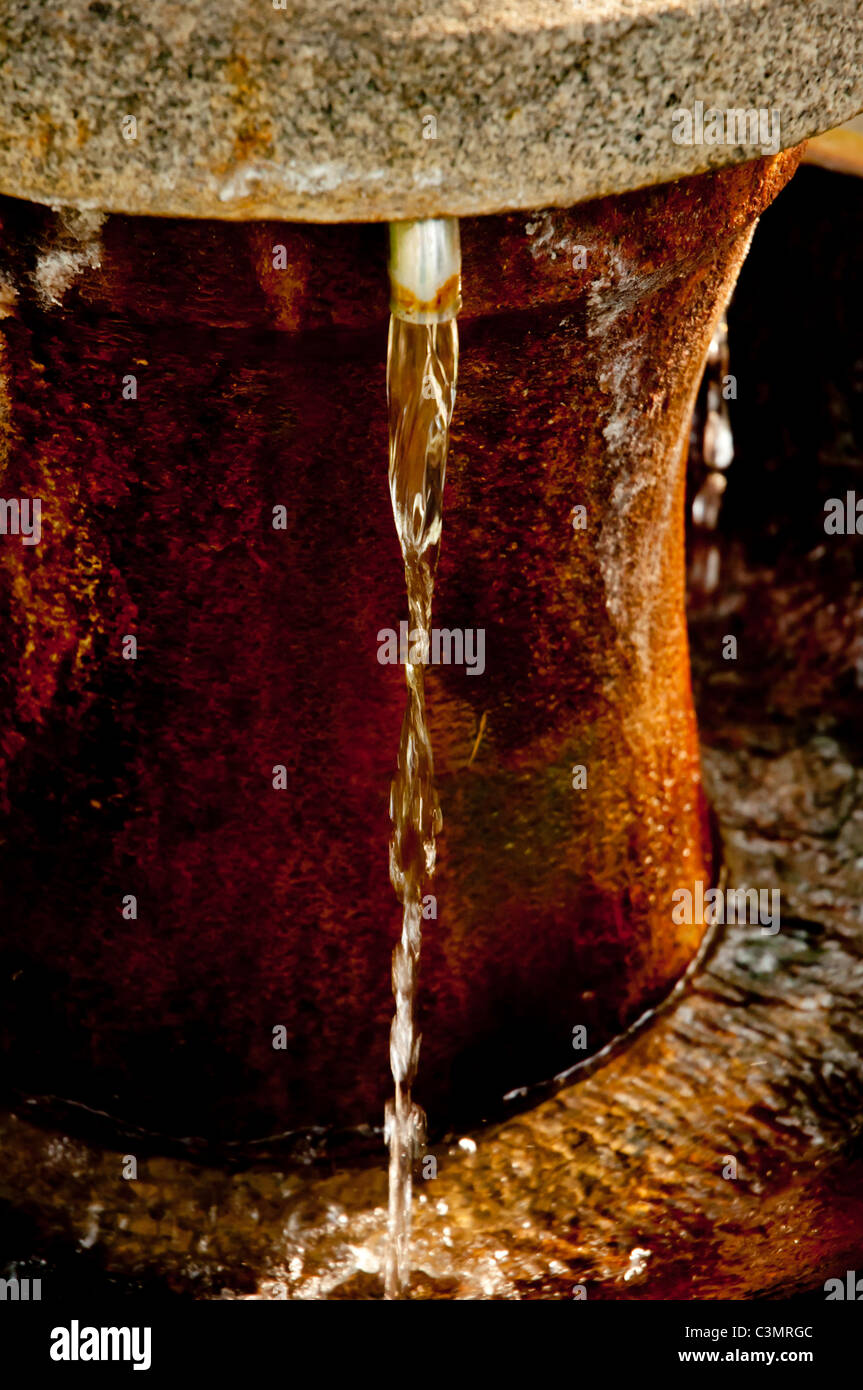 Flowing Spring Water in Rusty Drinking Fountain Stock Photo - Alamy