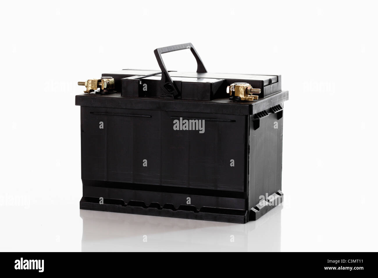 Car battery against white background Stock Photo - Alamy