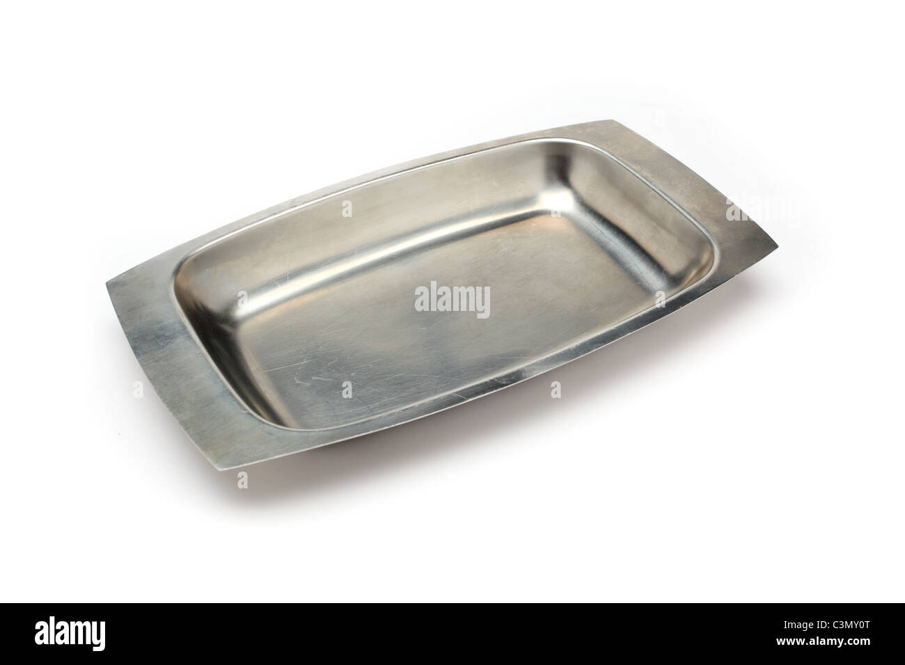 Metal dish lit oven tray above antique hi-res stock photography and ...