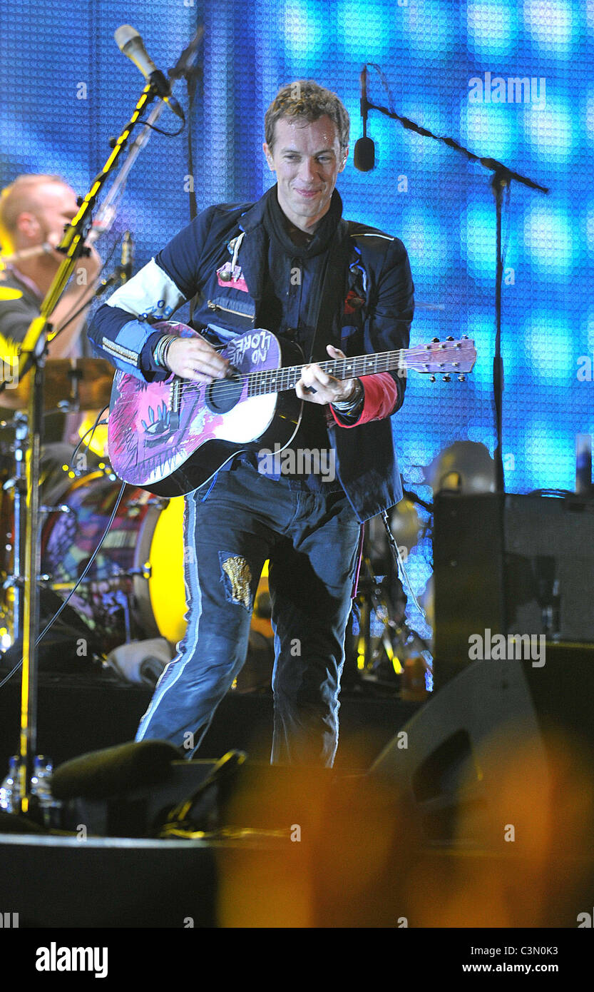 Chris Martin of Coldplay Coldplay live at the Wembley Stadium promoting ...