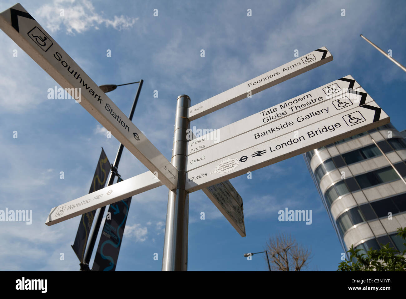 A collection of sign posts near to Southwark Bridge, London, England ...