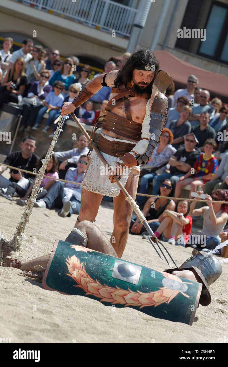 Gladiators fighting at the Roman and Greek festival in L'Escala, Spain ...
