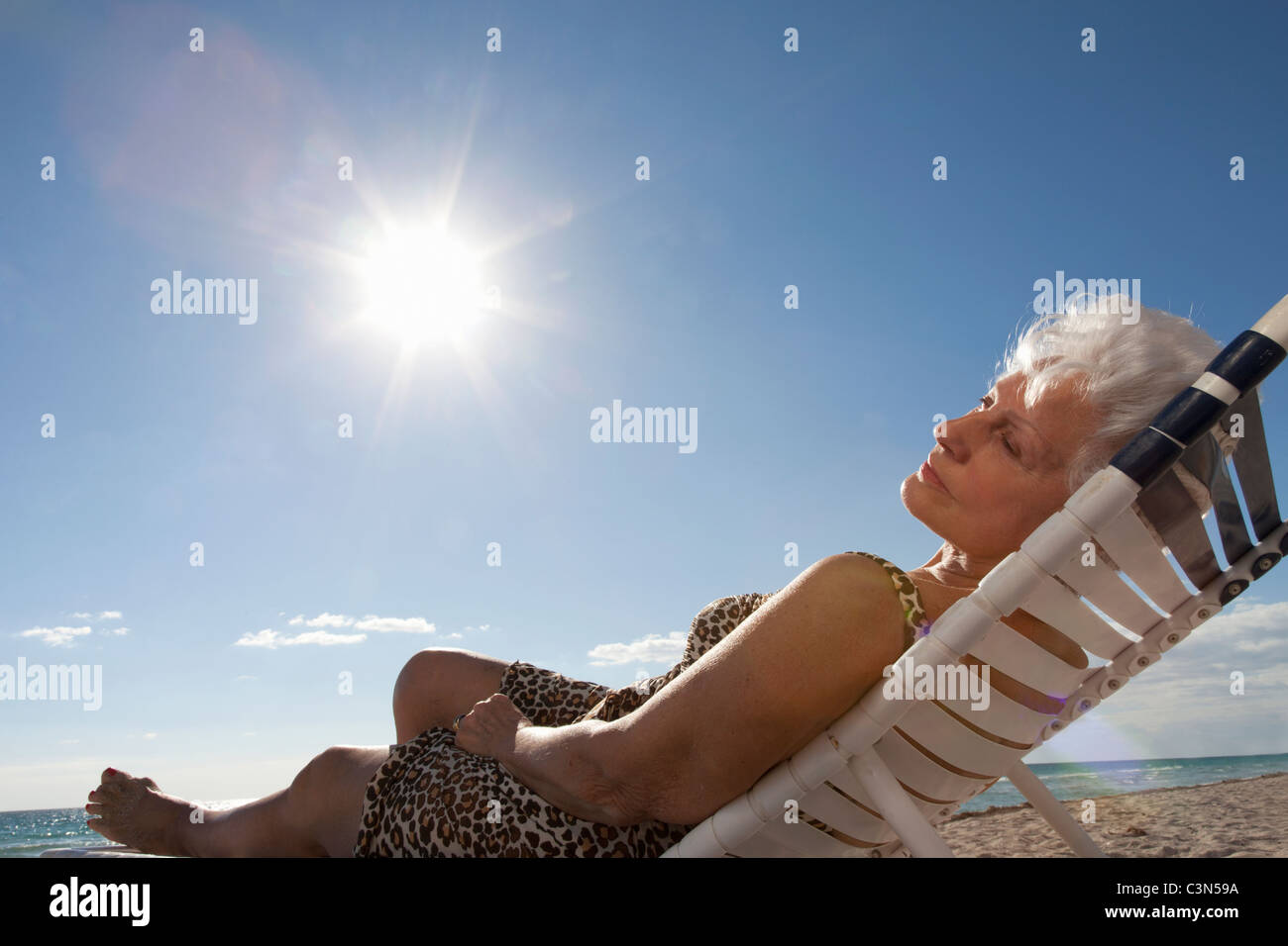 Senior Woman on the beach Stock Photo - Alamy