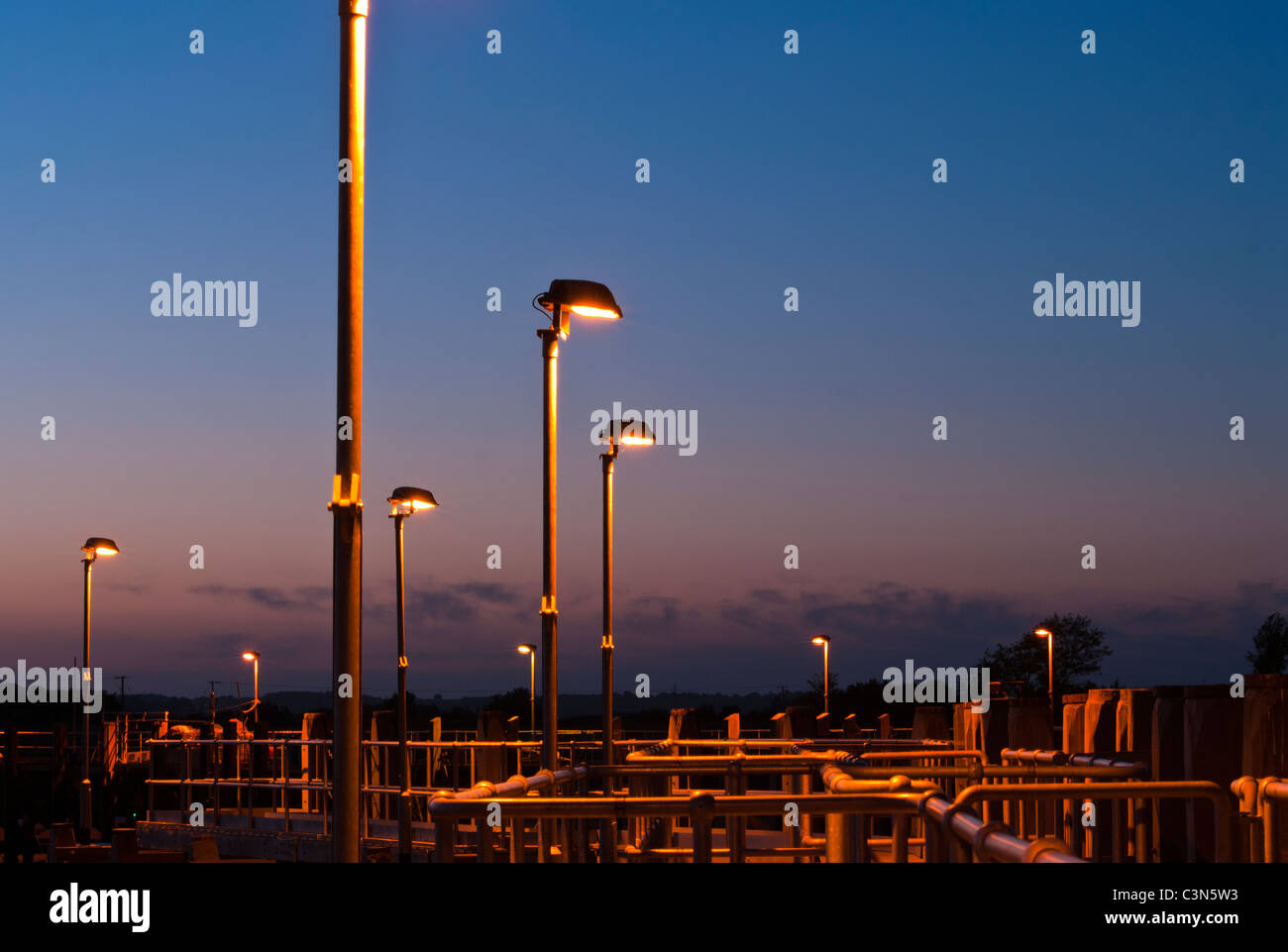 Floodlit Jetty At Night Stock Photo - Alamy