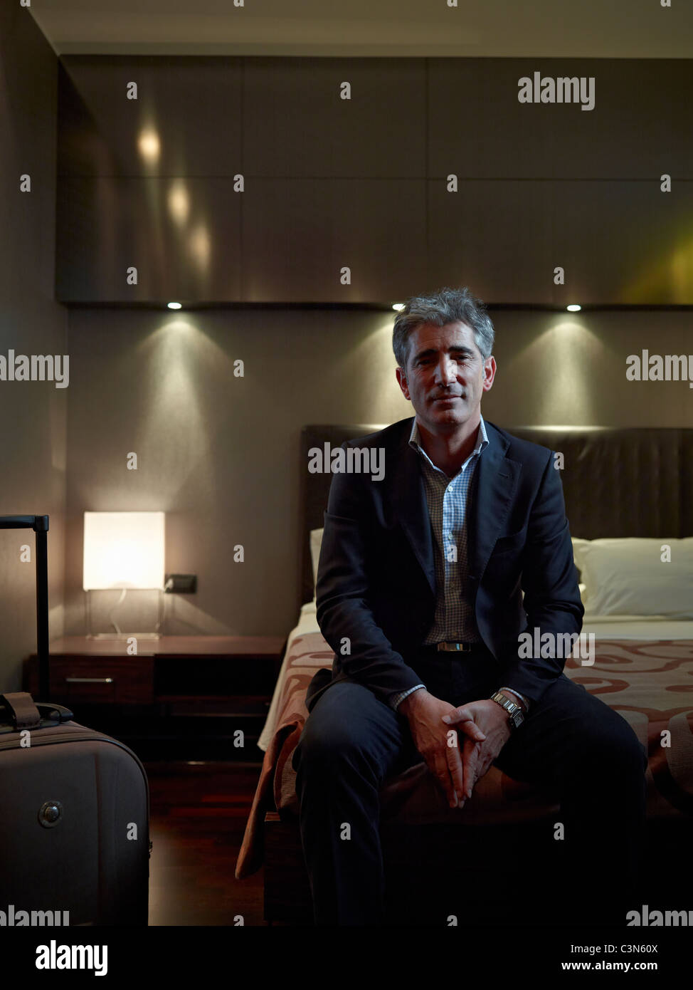 Business man in his hotel room Stock Photo - Alamy