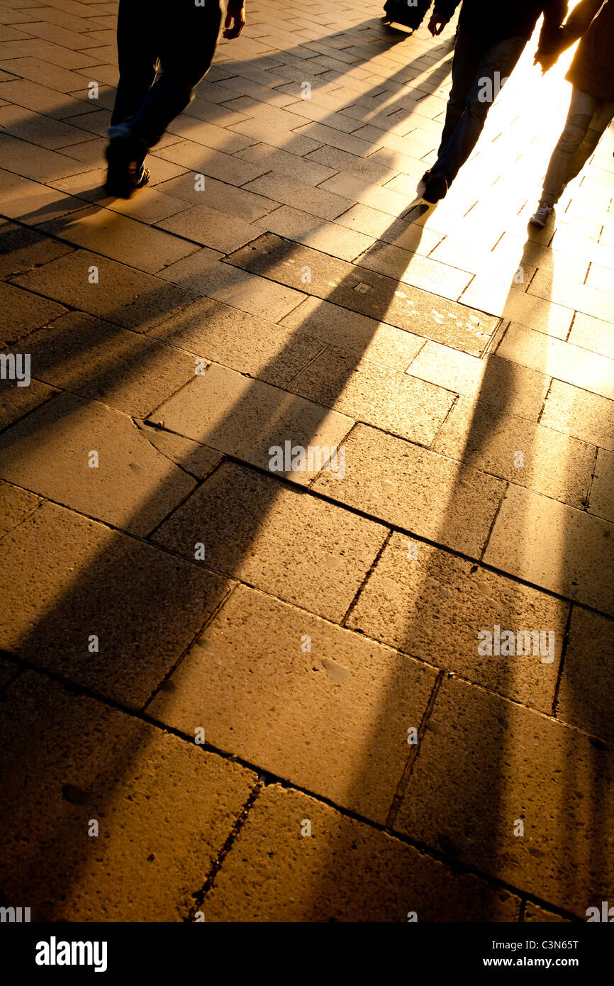 People walking shadows hi-res stock photography and images - Alamy