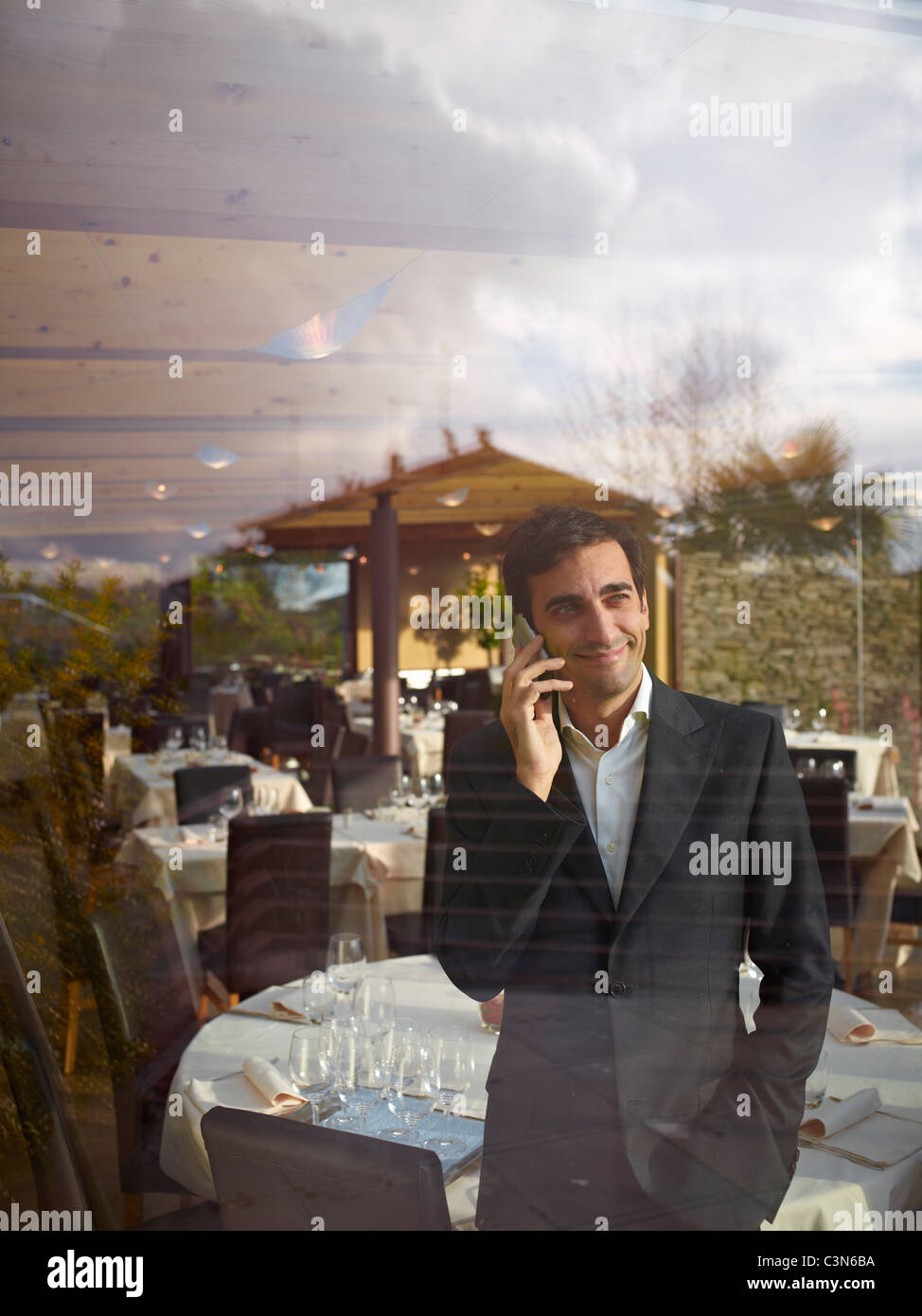 Mid adult man waiting in restaurant hi-res stock photography and images ...