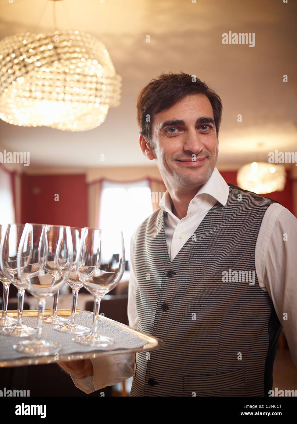 Waiter in Restaurant Stock Photo - Alamy