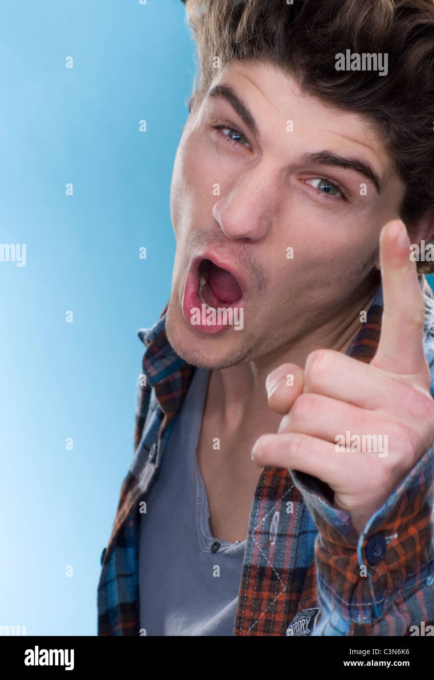 Angry guy yelling finger pointing hi-res stock photography and images ...
