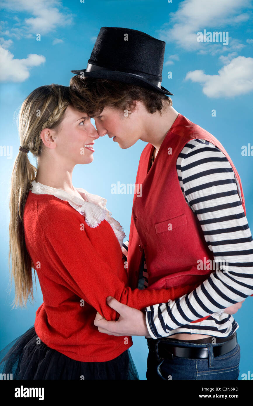 Loving couple wear red look together Stock Photo - Alamy