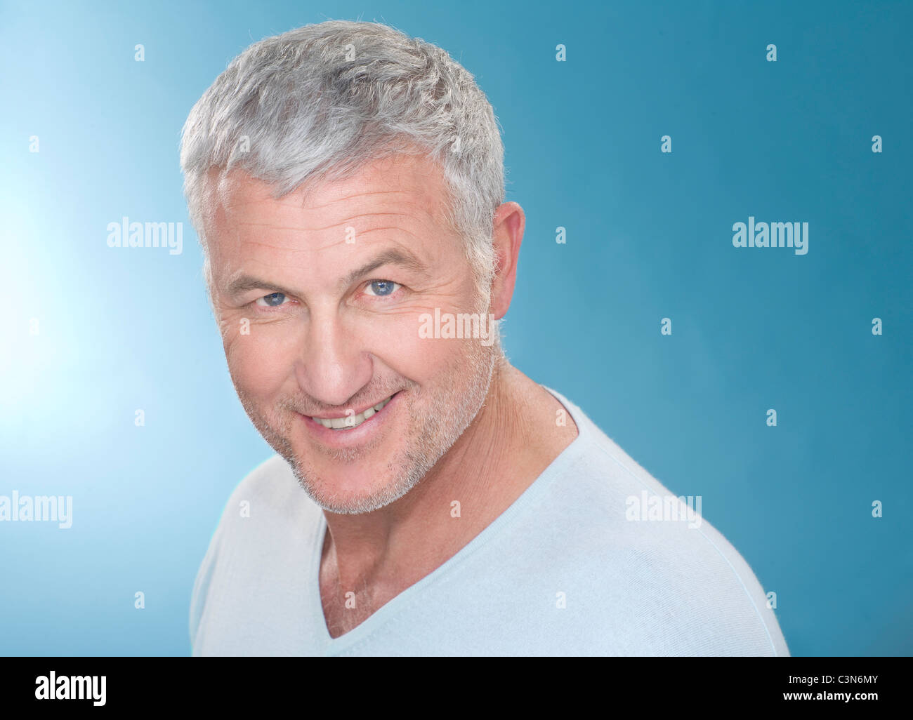 Grey hair man smile portrait Stock Photo - Alamy