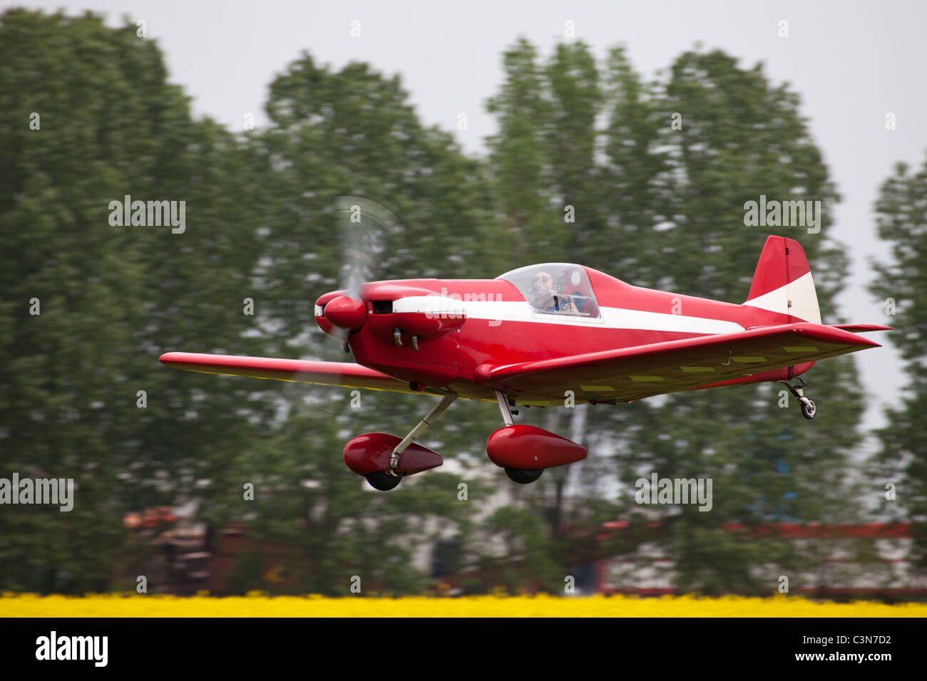 Taylor Titch G-BKDW in flight low along runway at Breighton Airfield ...