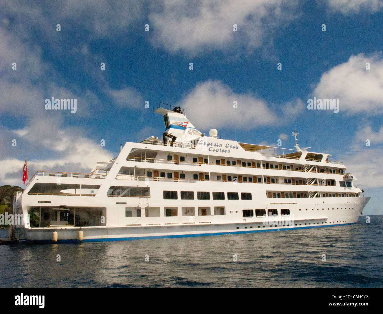Captain Cook Cruises Ship navigates the pacific ocean coast along the ...